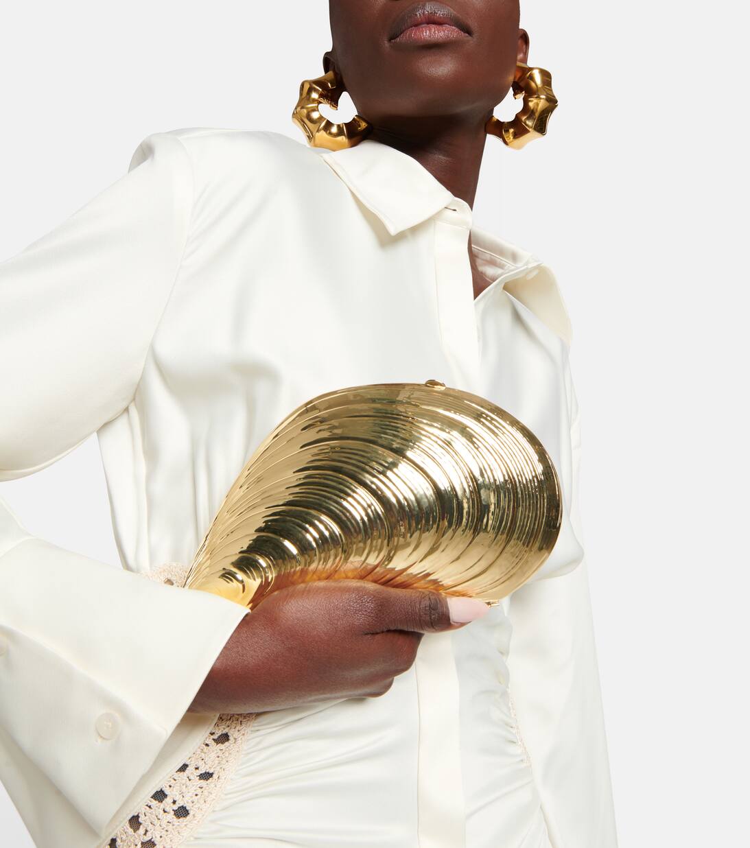 Bridget Metal Shell Clutch in Gold - Simkhai | Mytheresa