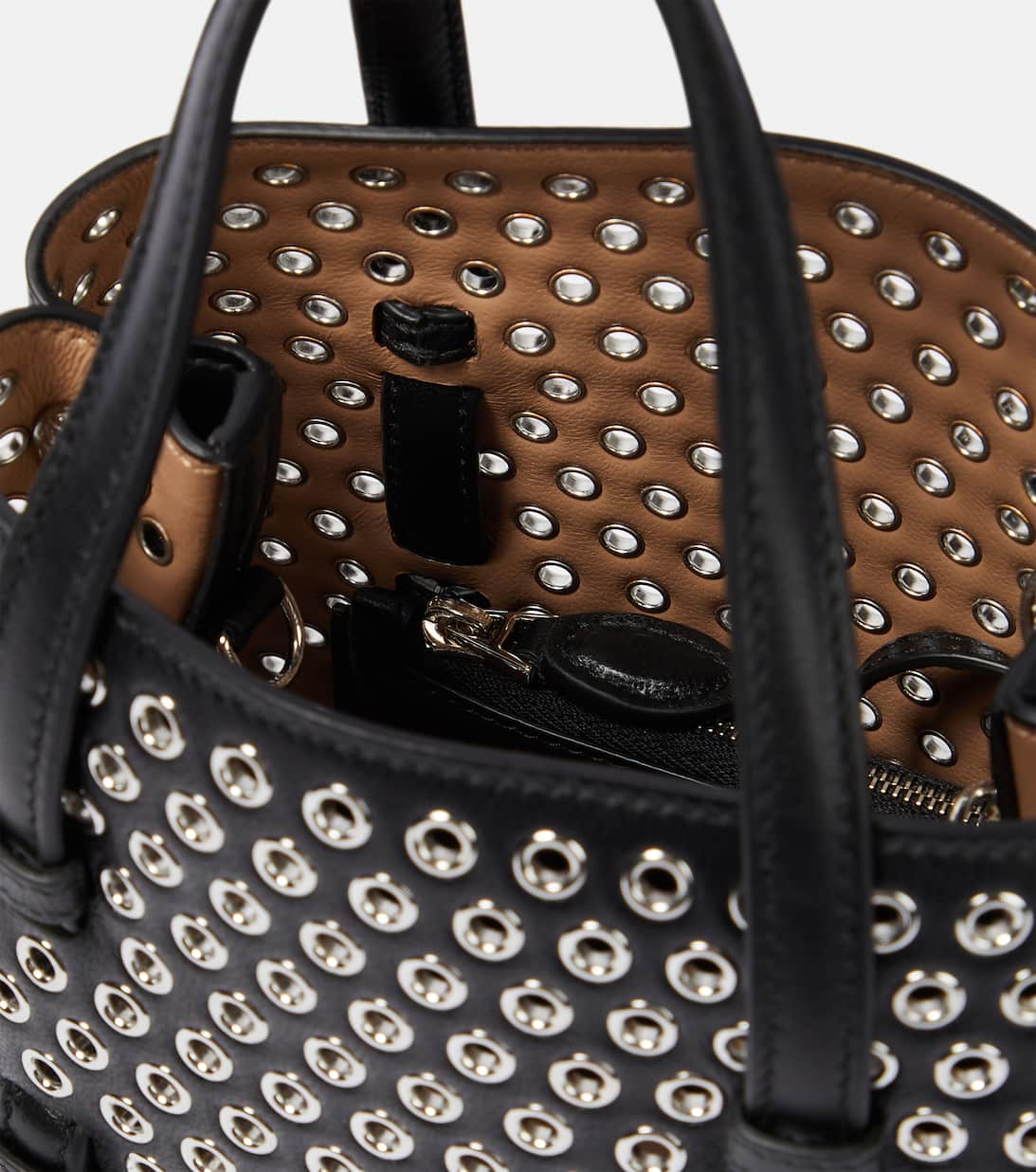 Mina Eyelet 20 Leather Tote Bag in Black - Alaia | Mytheresa
