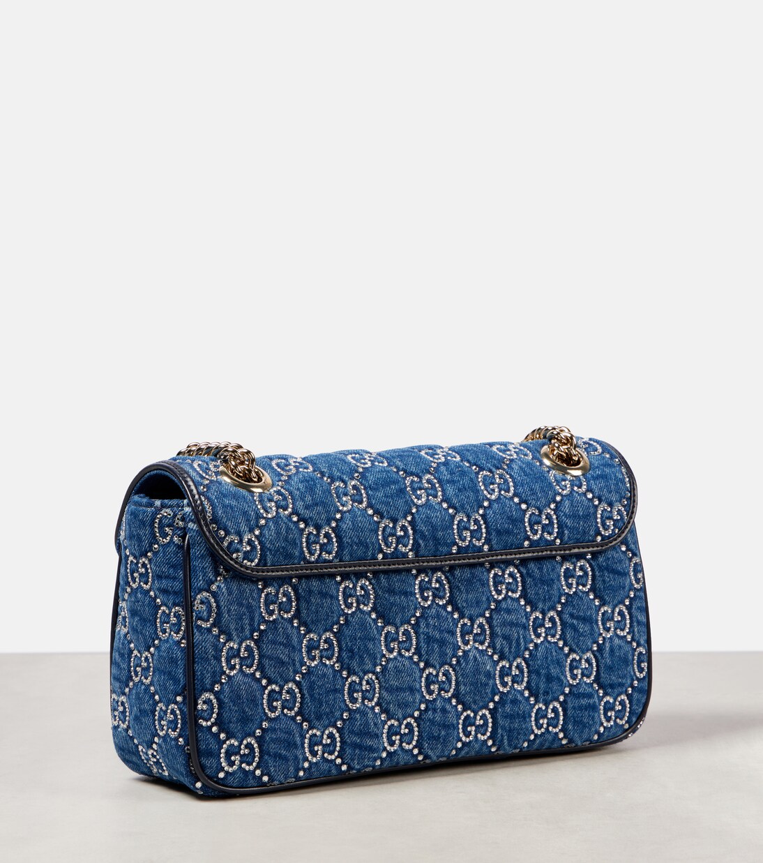 GG Marmont embellished denim shoulder bag in blue - Gucci | Mytheresa