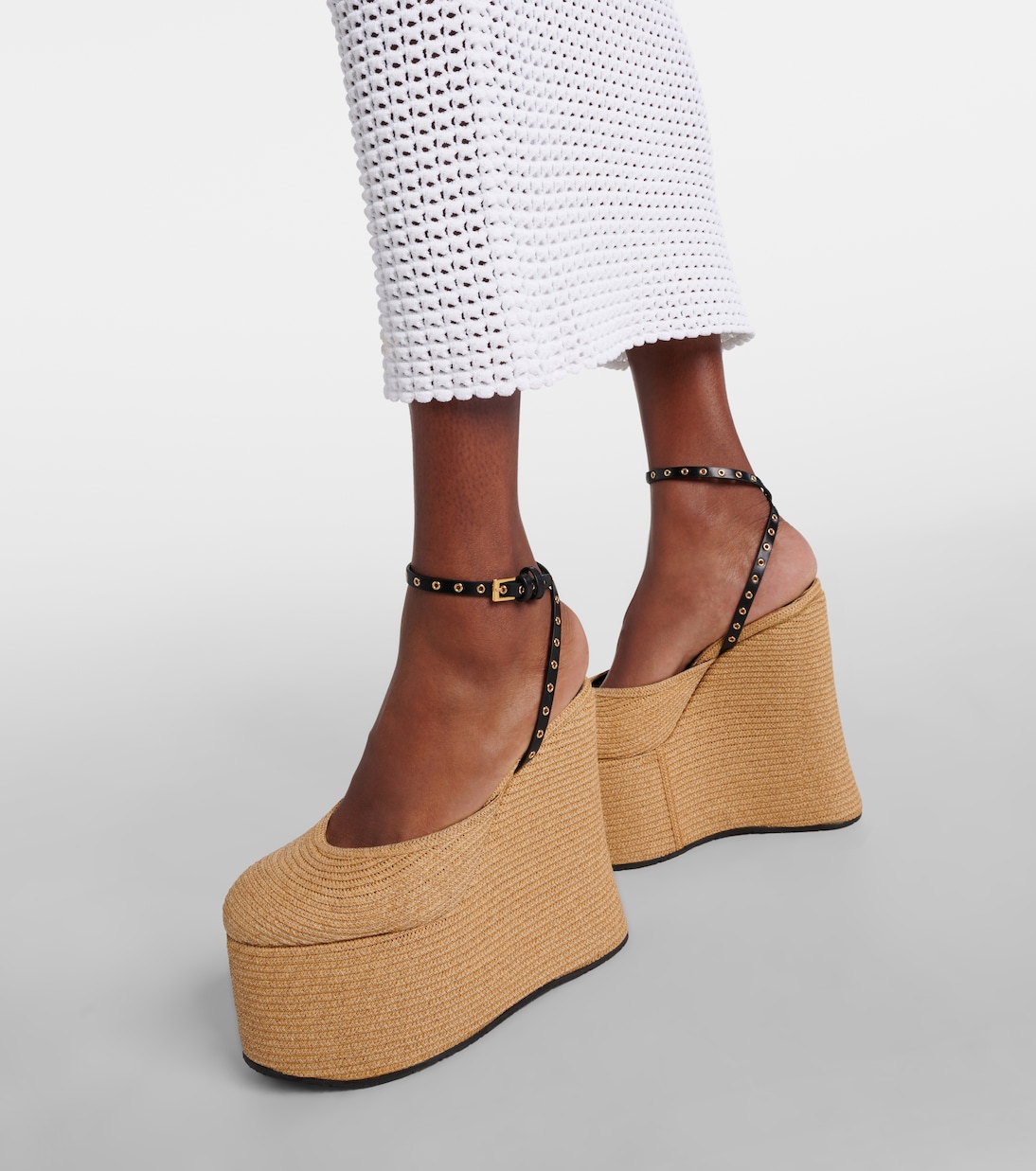 Leather-trimmed raffia wedge sandals in beige - Alaia | Mytheresa