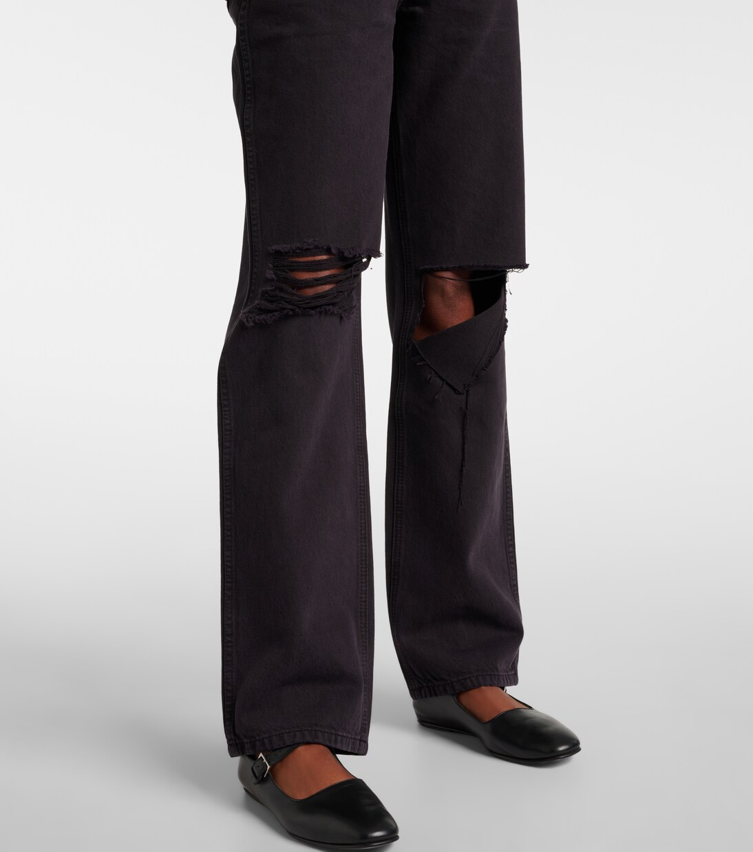 90s distressed high-rise flared jeans in black - Re Done | Mytheresa