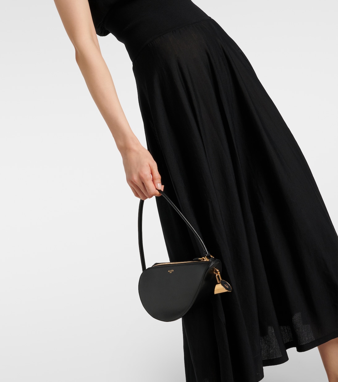 Le Demi-Cœur leather shoulder bag in black - Alaia | Mytheresa