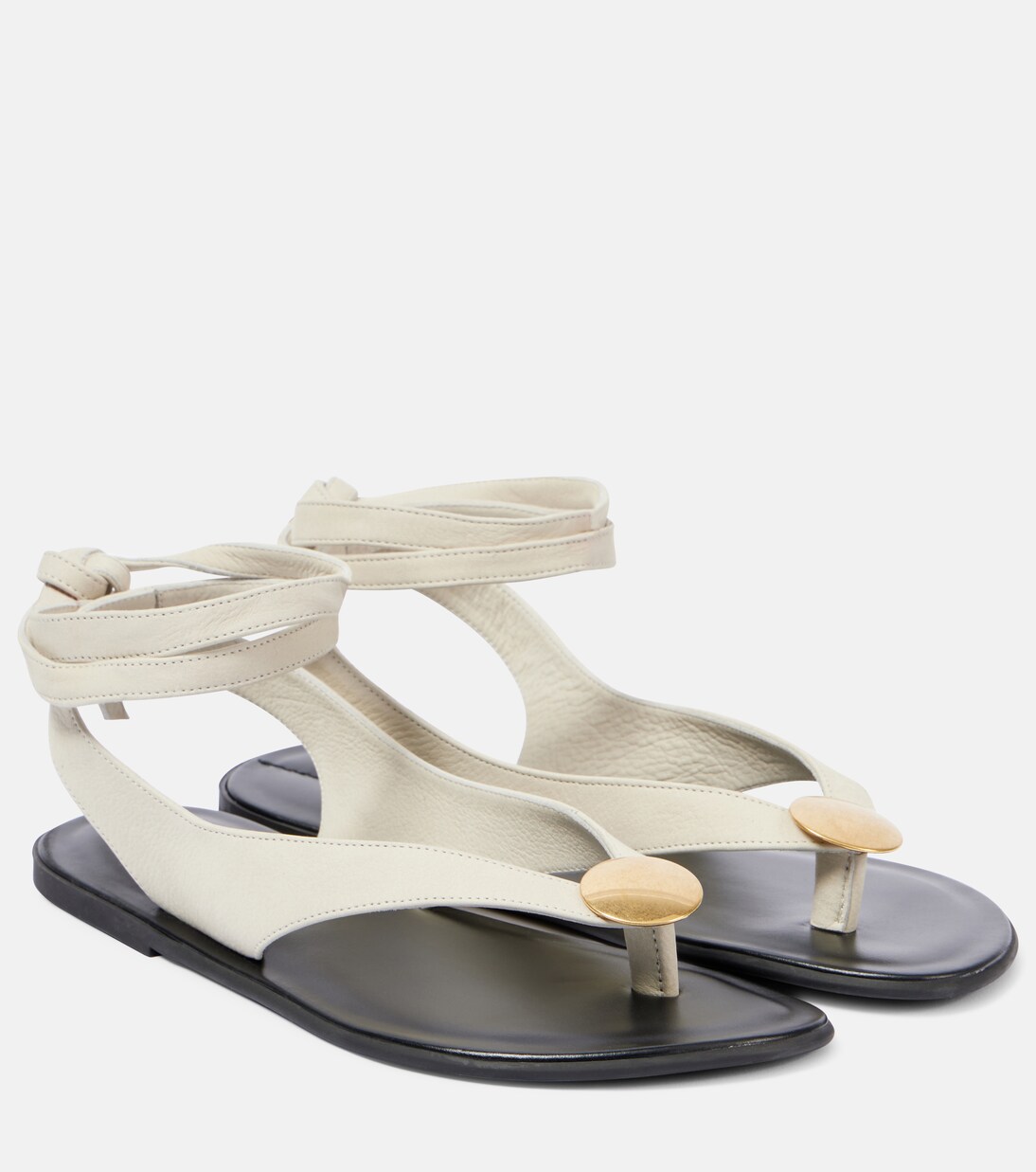 Charm leather thong sandals in grey - The Row | Mytheresa