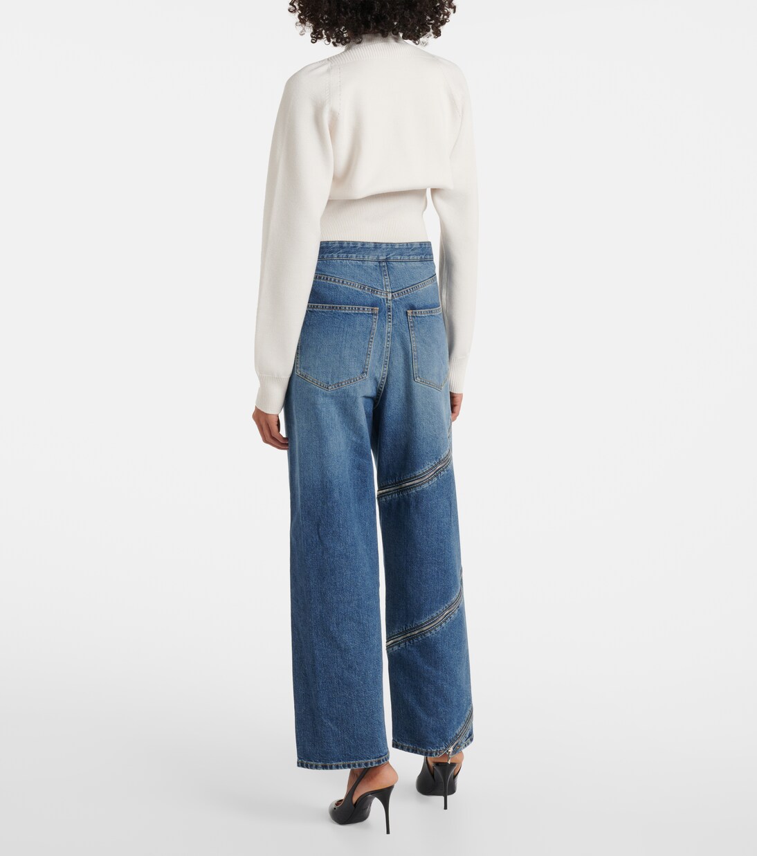 Zip-up wide-leg jeans in blue - Alaia | Mytheresa