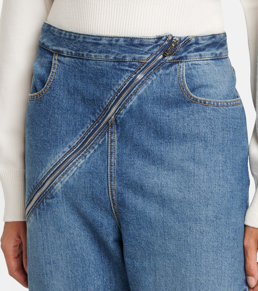 Zip-up wide-leg jeans in blue - Alaia | Mytheresa