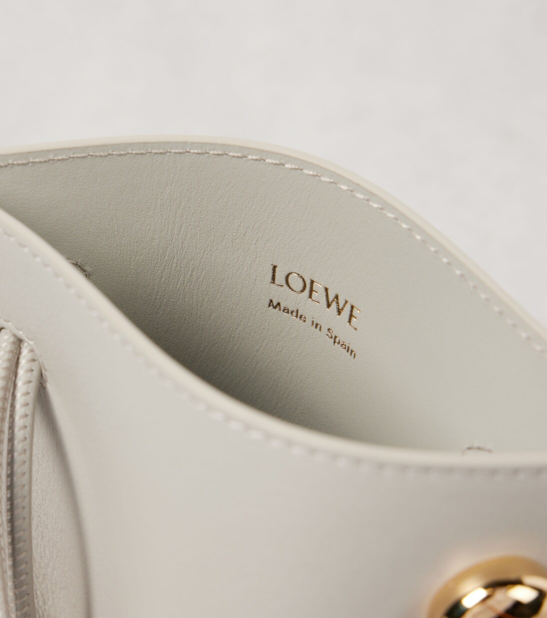 Pebble Dice leather iPhone case in grey - Loewe | Mytheresa