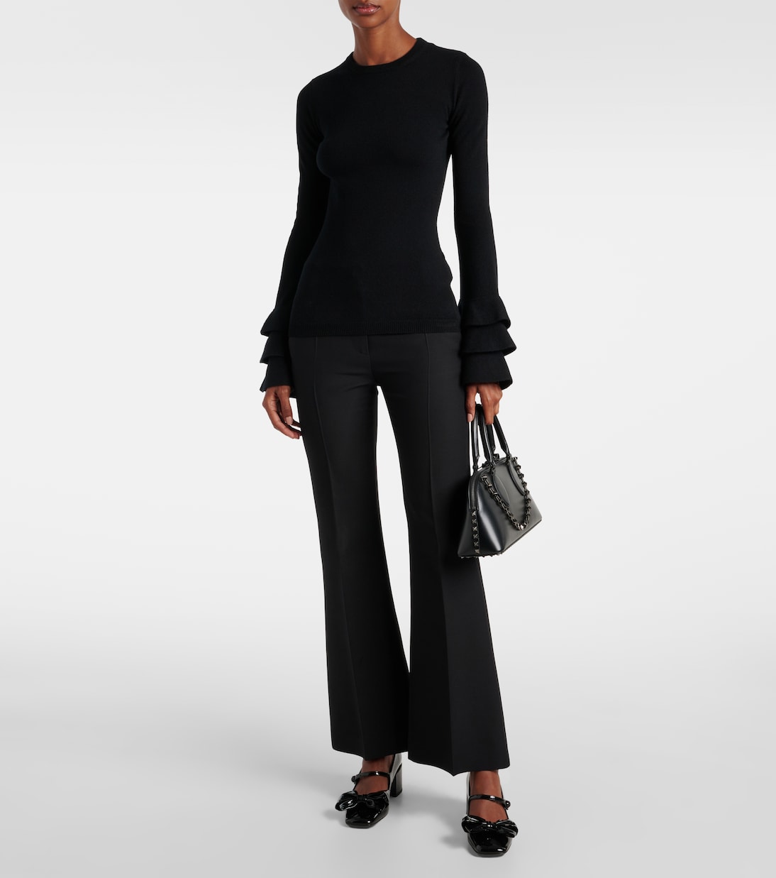 Ruffled wool sweater in black - Valentino | Mytheresa