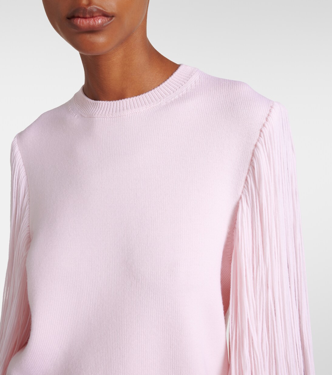 Tassel wool sweater in pink - Alaia | Mytheresa