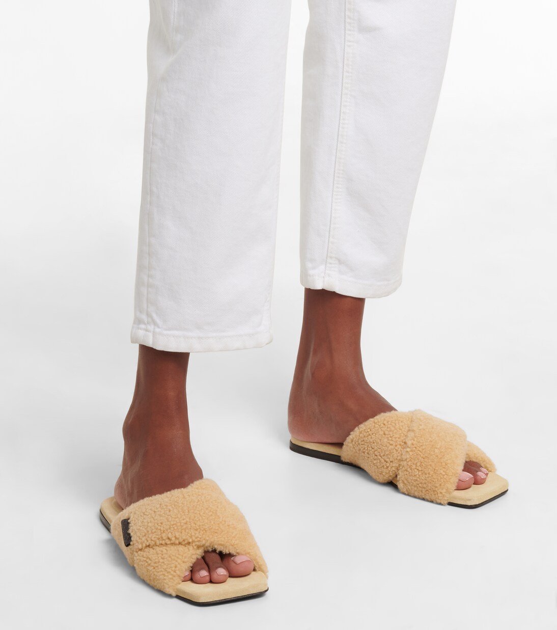 Embellished shearling slides in beige - Brunello Cucinelli | Mytheresa