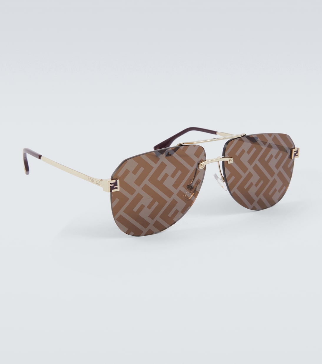 Fendi Sky logo aviator sunglasses in gold - Fendi | Mytheresa