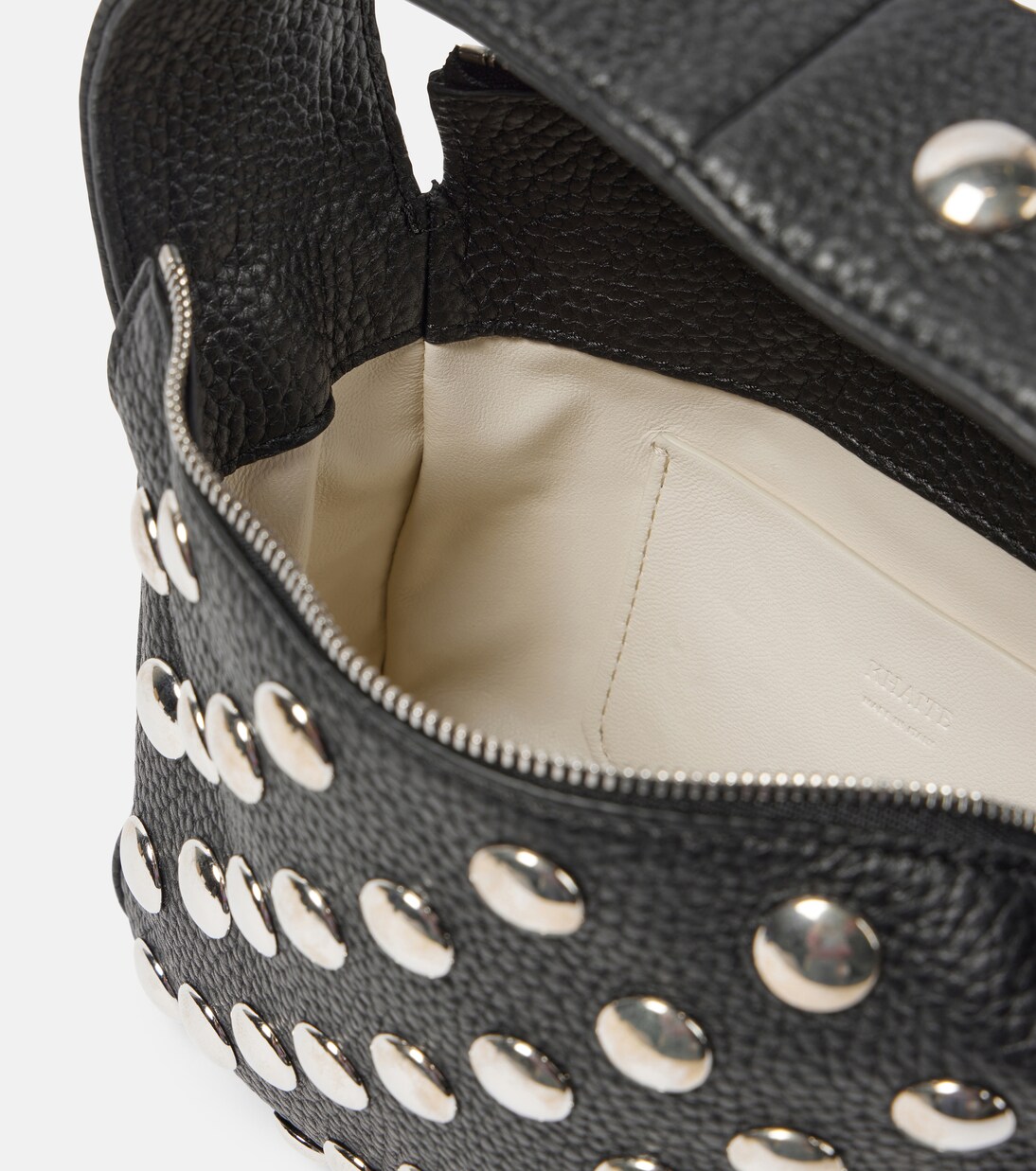 Elena Small studded leather shoulder bag in black - Khaite | Mytheresa