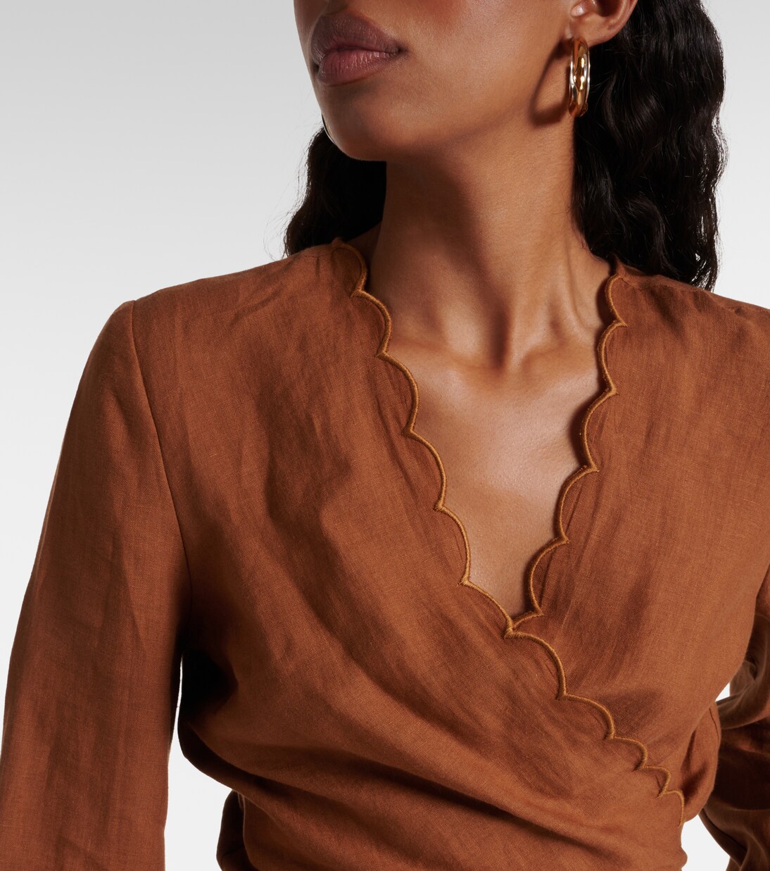 Joli scalloped linen wrap top in brown - Eres | Mytheresa