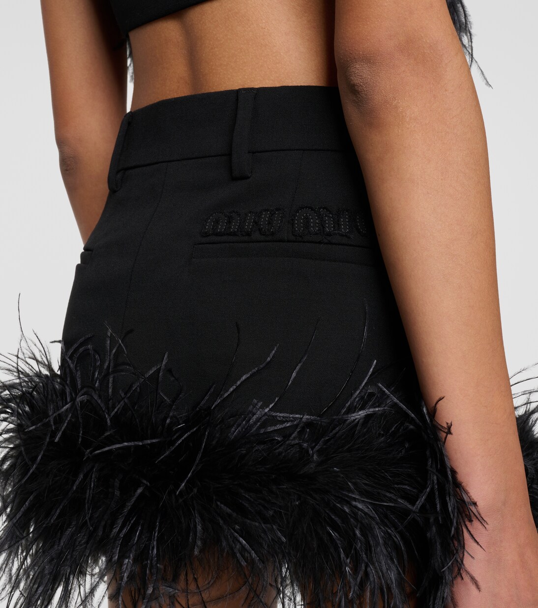 Feather-trimmed wool miniskirt in black - Miu Miu | Mytheresa