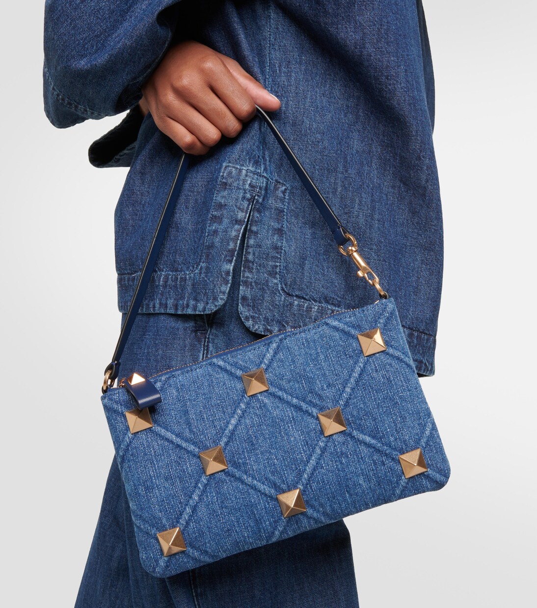 Roman Stud Mini denim shoulder bag in blue - Valentino Garavani | Mytheresa