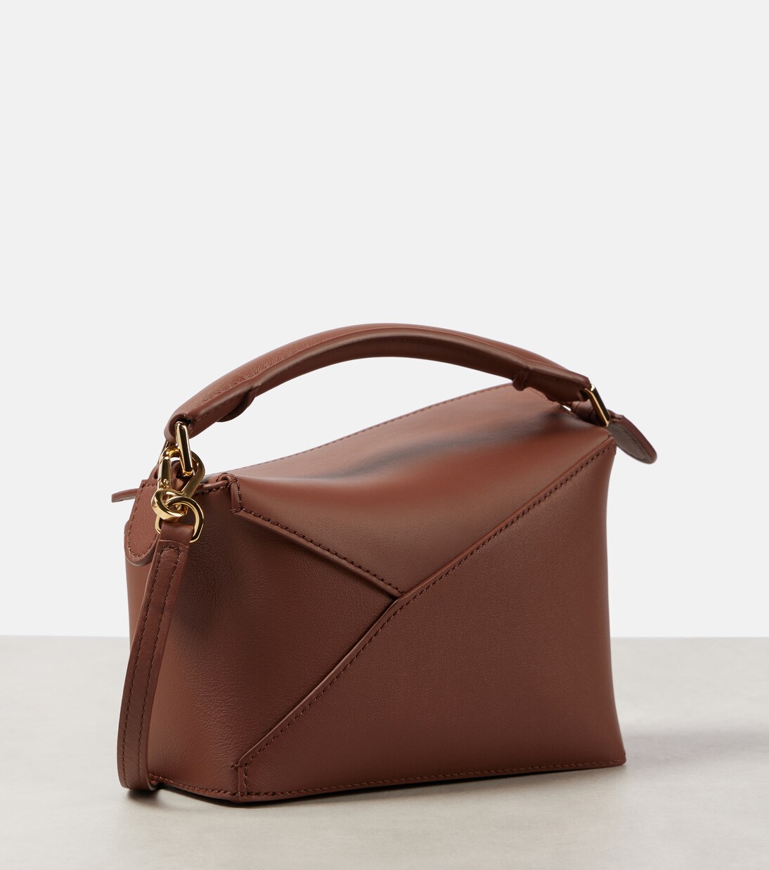 x Suna Fujita Puzzle Edge Hamster Mini crossbody bag in brown - Loewe ...