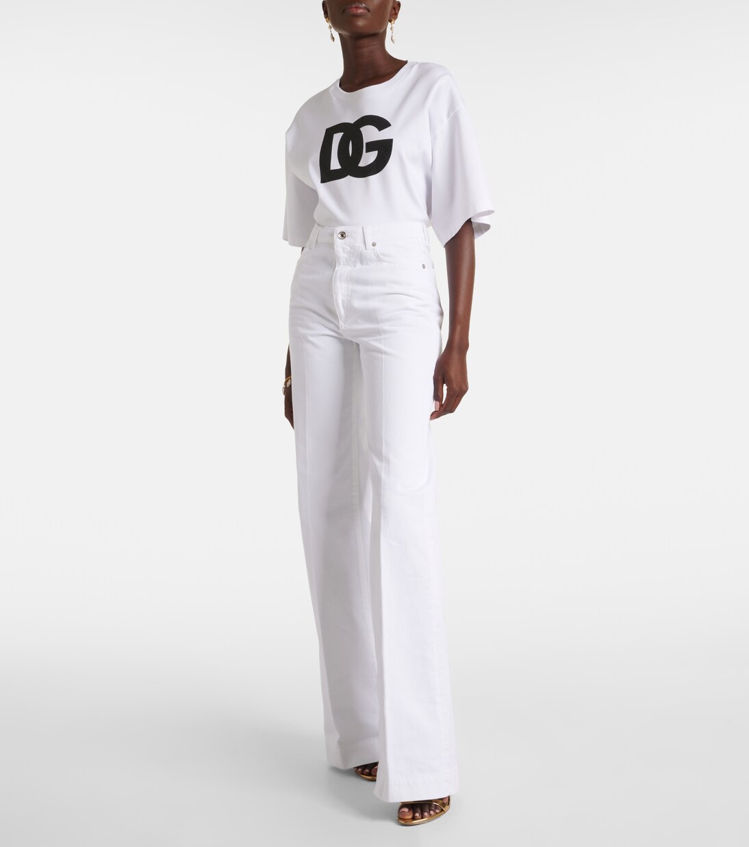 Capri high-rise flared jeans in white - Dolce Gabbana | Mytheresa
