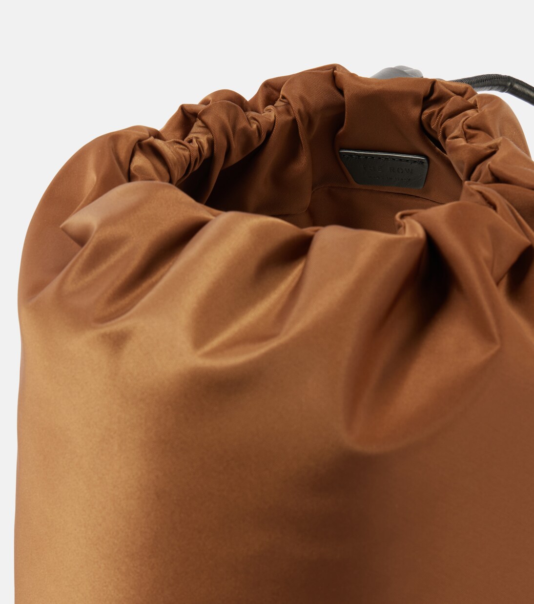 Sporty leather-trimmed backpack in brown - The Row | Mytheresa