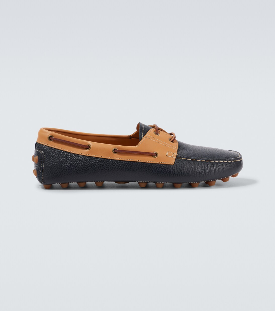 Gommino Bubble leather boat shoes in blue - Tods | Mytheresa