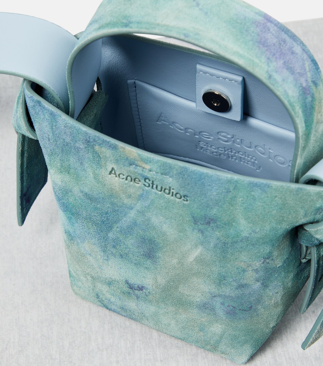 Musubi Micro suede crossbody bag in blue - Acne Studios | Mytheresa