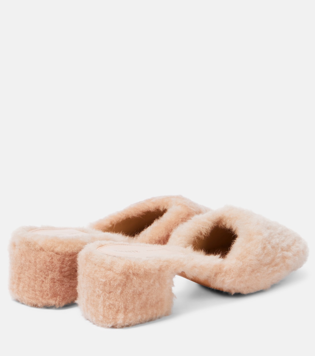 Clio shearling mules in pink - Khaite | Mytheresa