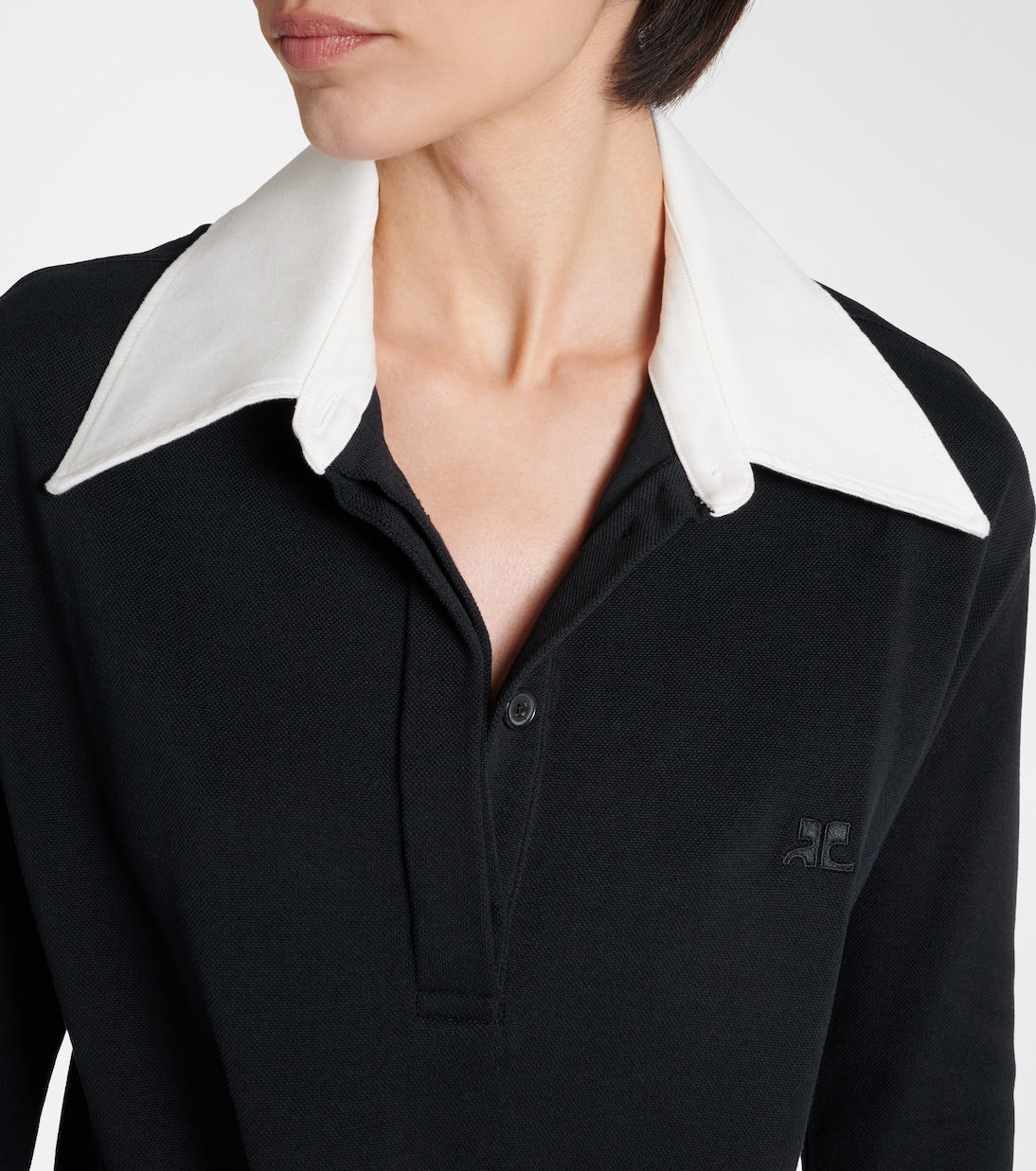 Twist cotton-blend piqué polo dress in black - Courreges | Mytheresa