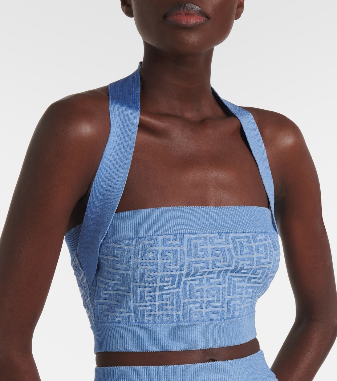 Monogram halterneck crop top in blue - Balmain | Mytheresa