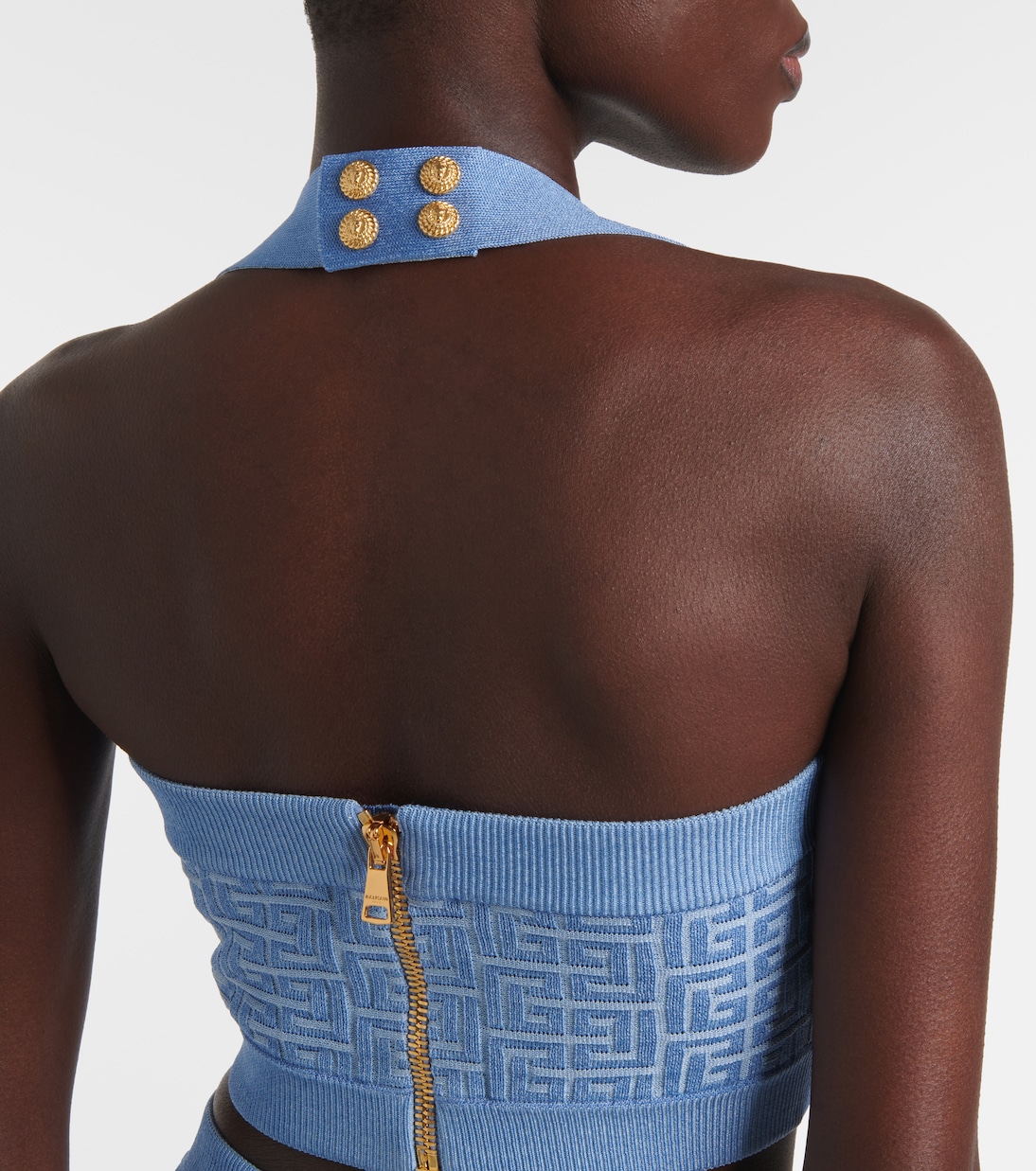 Monogram halterneck crop top in blue - Balmain | Mytheresa