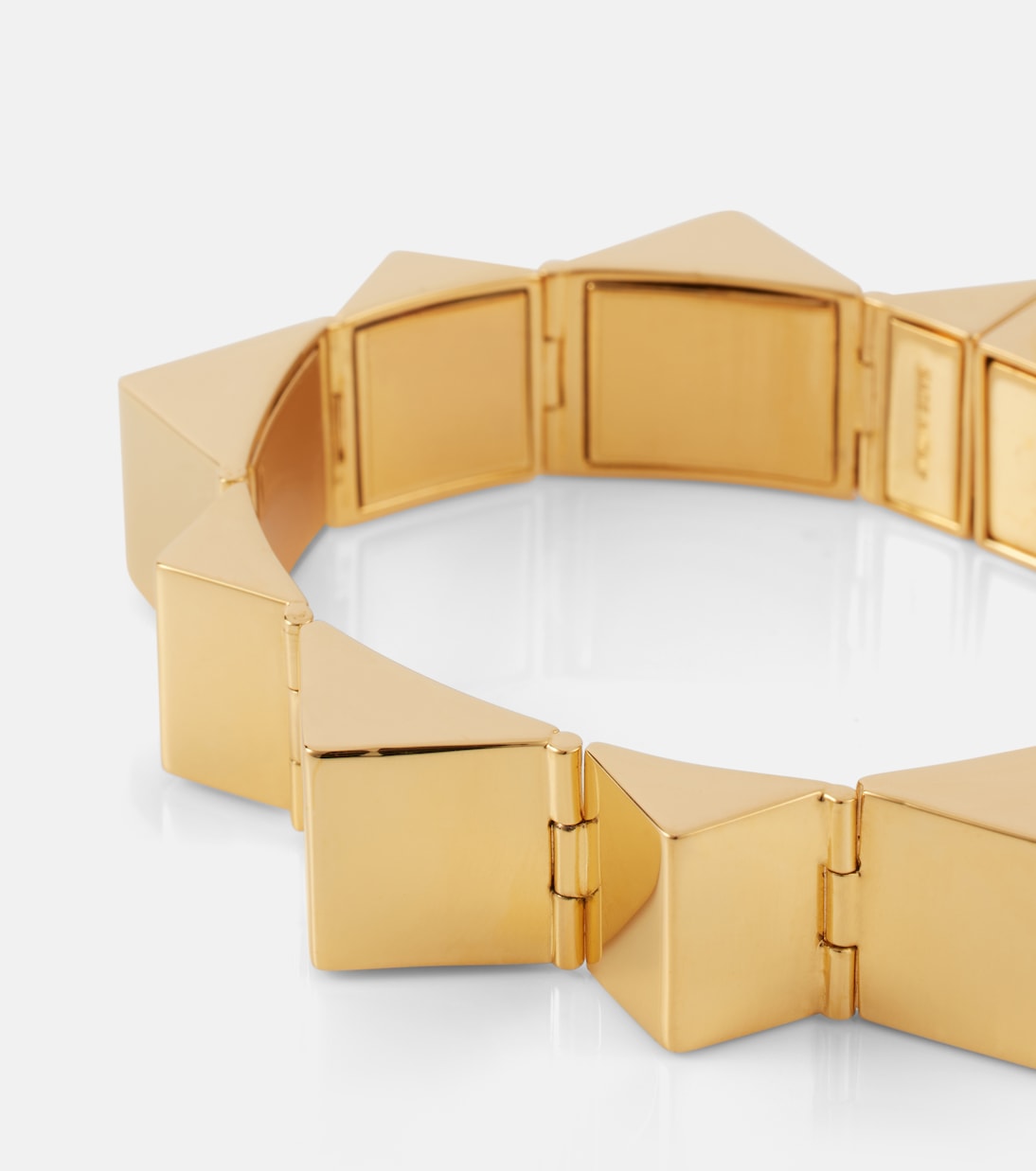 Pyramid bangle in gold - Alaia | Mytheresa