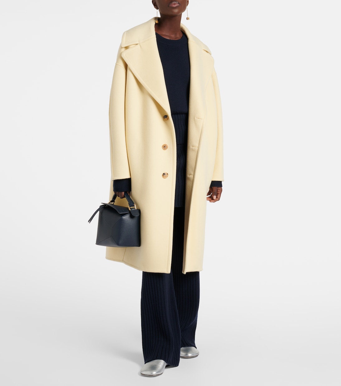 Wool coat in yellow - Loewe | Mytheresa