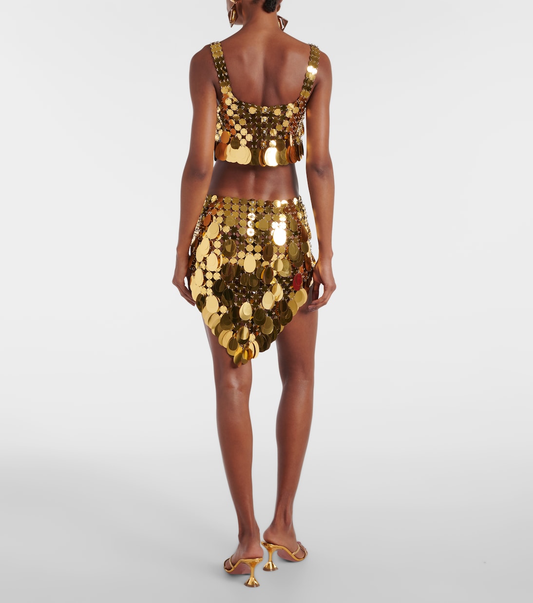 Golden Sparkle Assembly sequined crop top in gold - Rabanne | Mytheresa