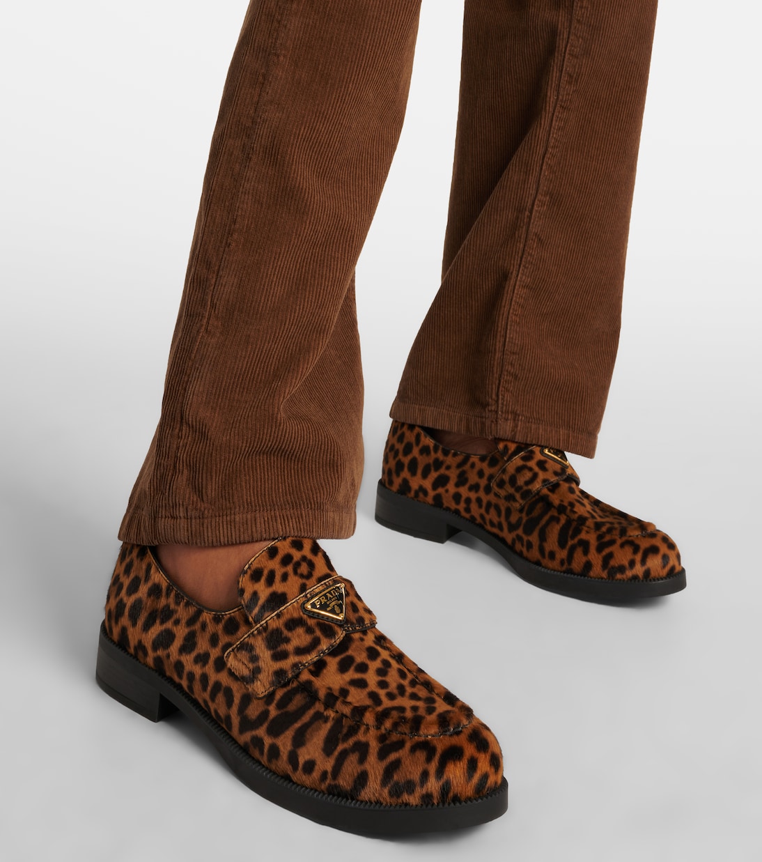 Logo leopard-print calf hair loafers in brown - Prada | Mytheresa