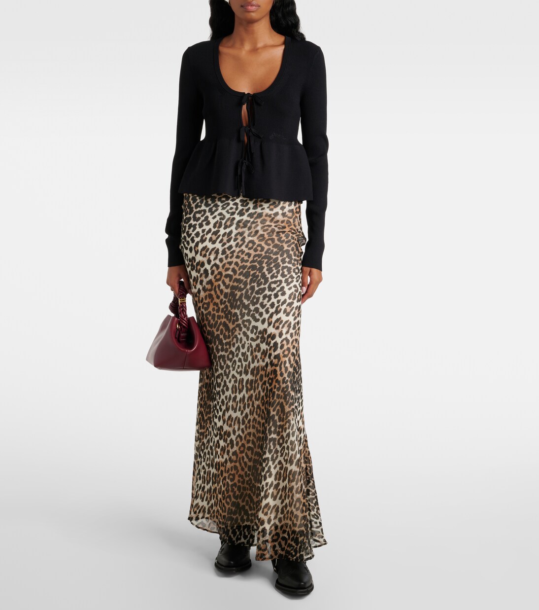 Ruffled ribbed-knit top in black - Ganni | Mytheresa