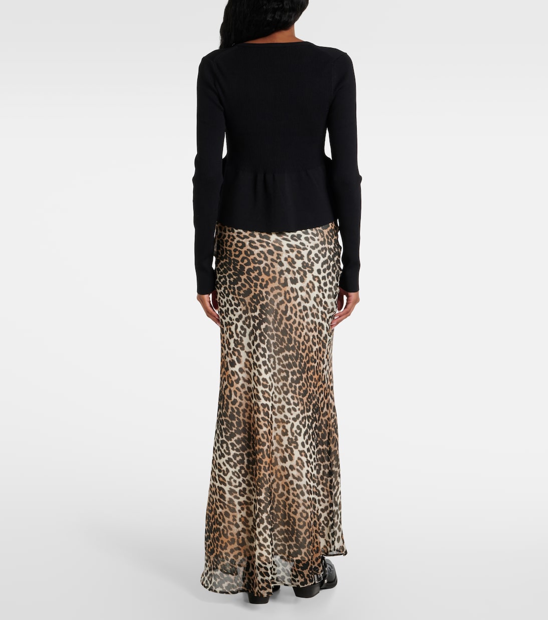 Ruffled ribbed-knit top in black - Ganni | Mytheresa