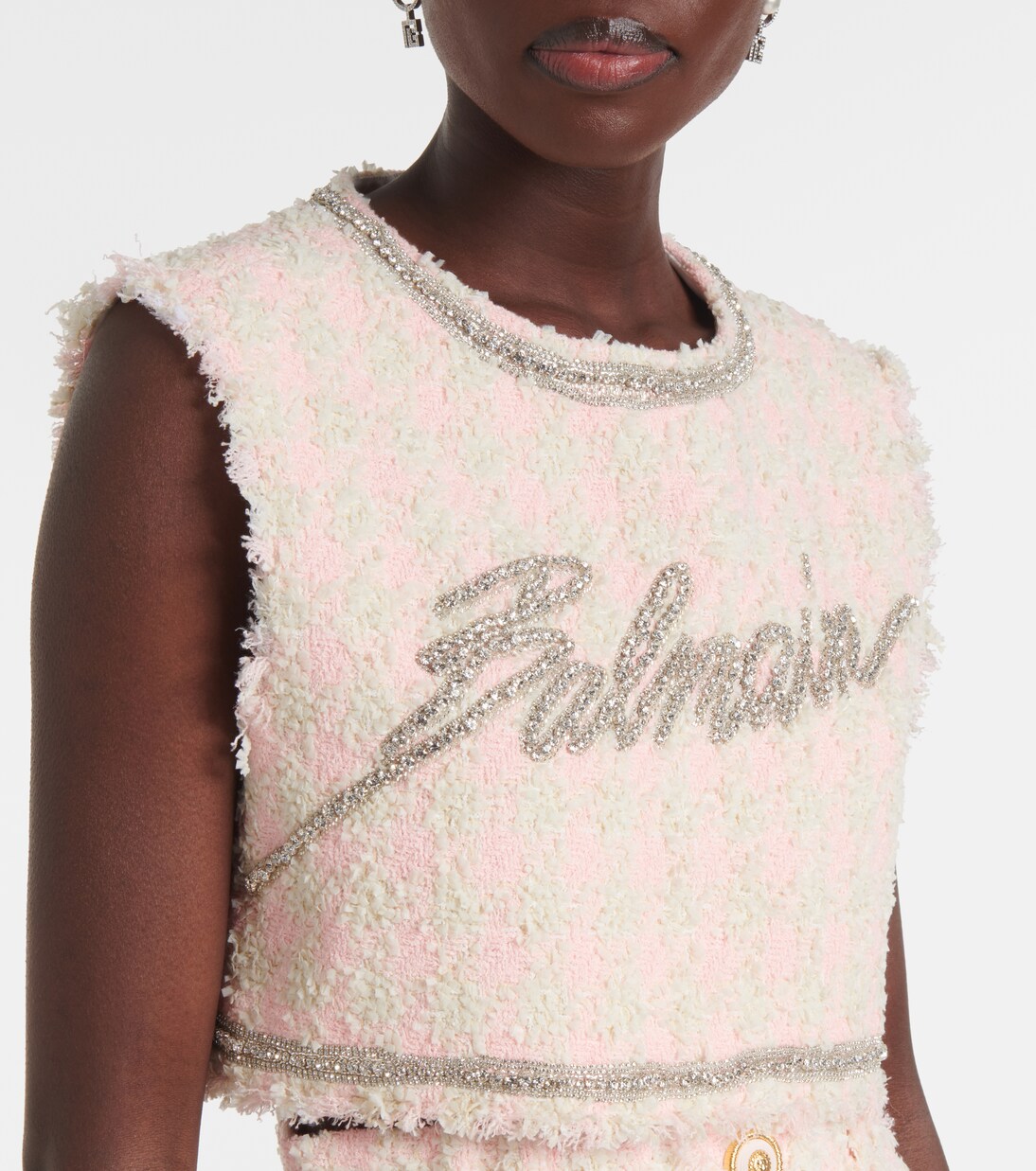 Logo embellished bouclé crop top in pink - Balmain | Mytheresa