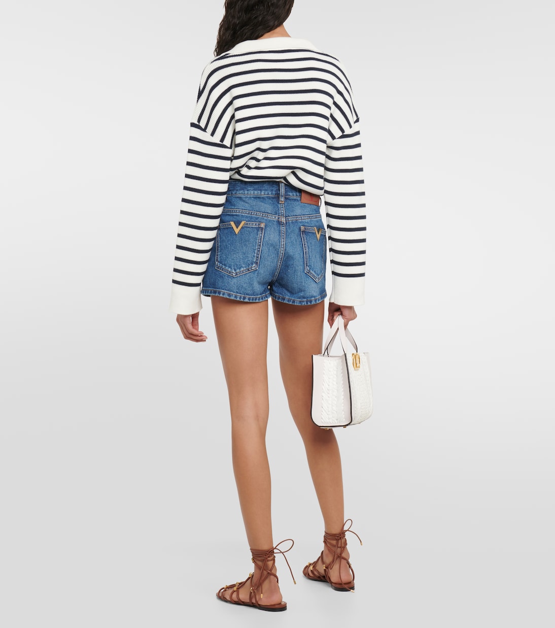 High-rise denim shorts in blue - Valentino | Mytheresa