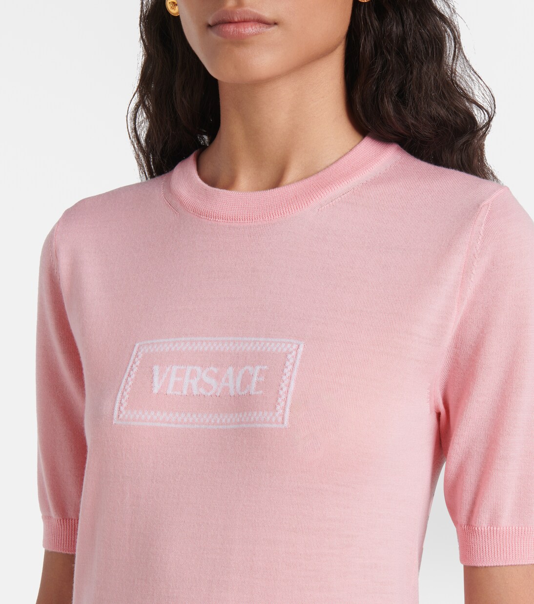 Logo jacquard knitted top in pink - Versace | Mytheresa