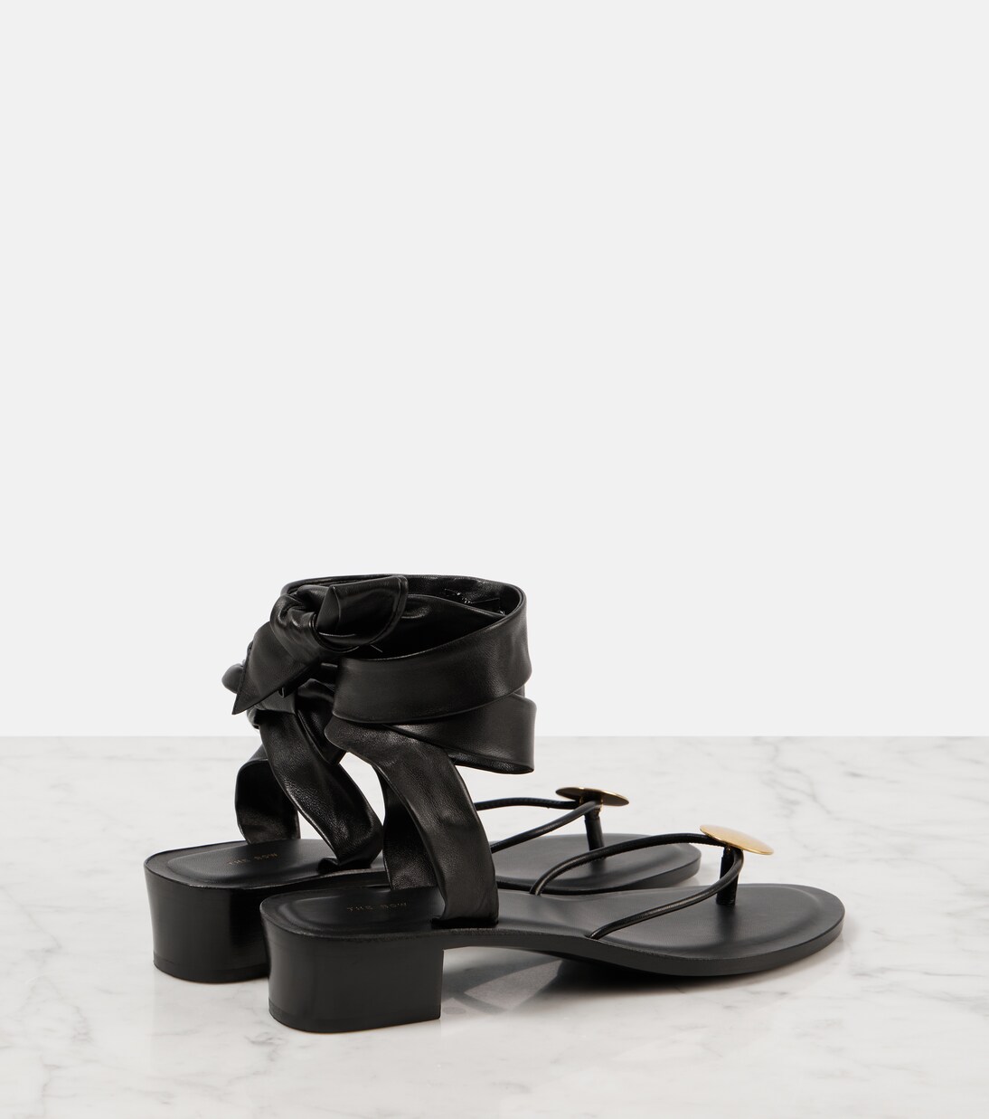 Cord leather thong sandals in black - The Row | Mytheresa