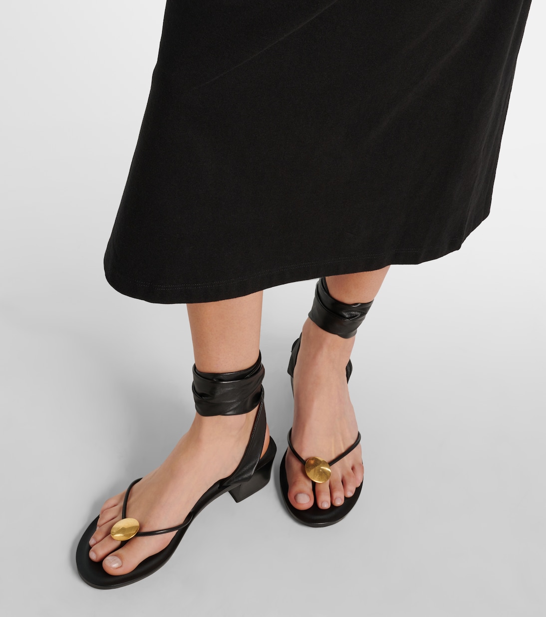 Cord leather thong sandals in black - The Row | Mytheresa