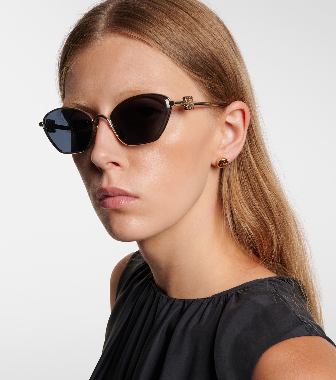 Gafas de sol cat-eye con anagrama en dorado - Loewe | Mytheresa
