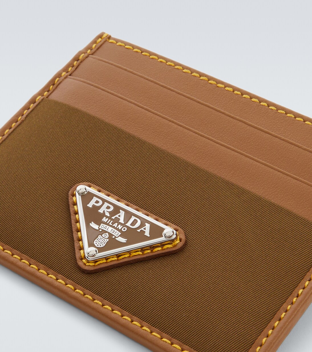 Re-Nylon leather-trimmed card case in brown - Prada | Mytheresa