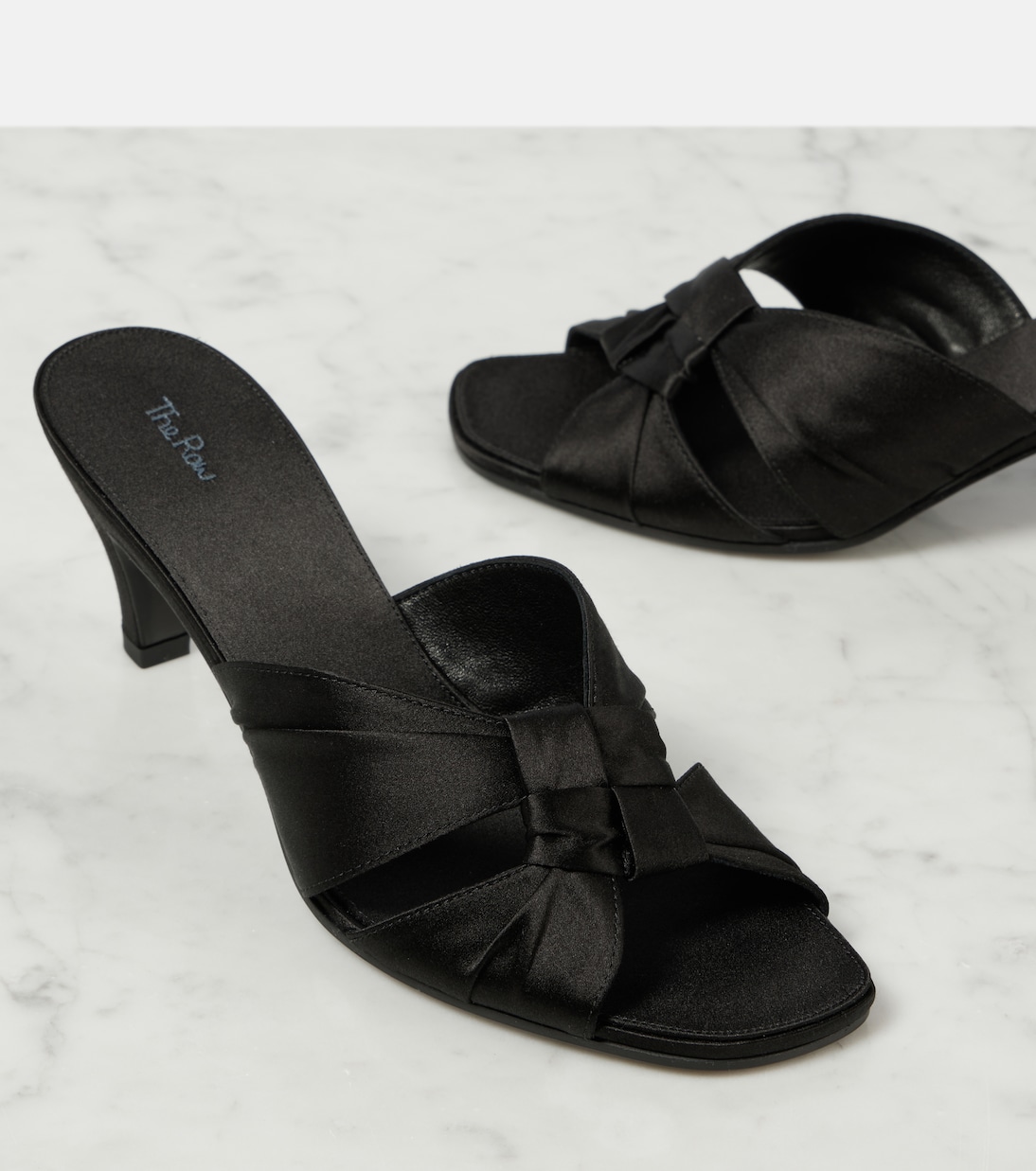 Soft Knot 65 satin mules in black - The Row | Mytheresa