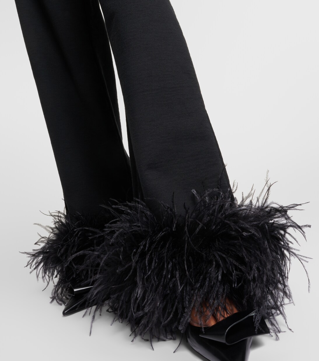 Feather-trimmed cotton sweatpants in black - Prada | Mytheresa