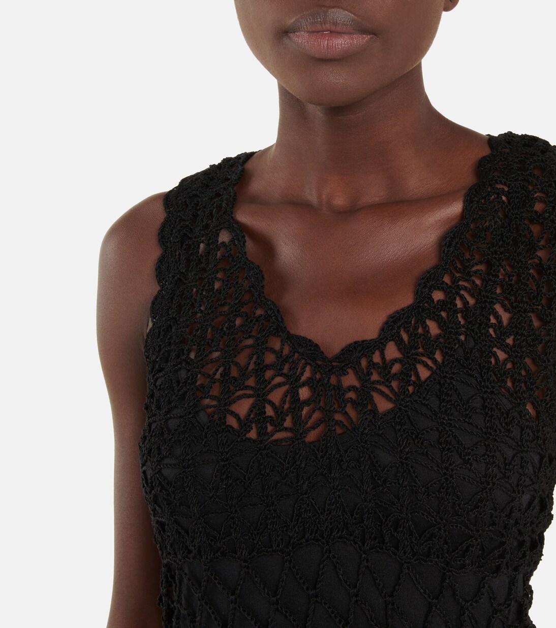 Gypsy crochet minidress in black - Anna Kosturova | Mytheresa