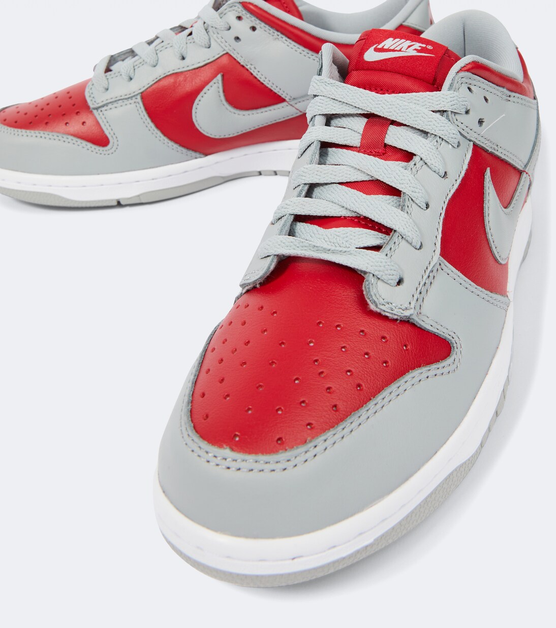 Dunk Low leather sneakers in grey - Nike | Mytheresa