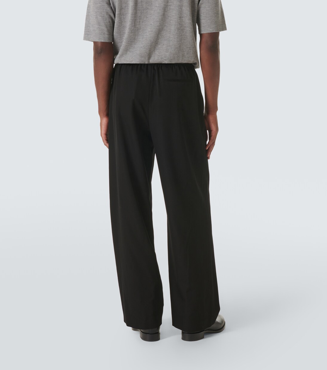 Pantalon ample Donatello en laine en noir – The Row | Mytheresa