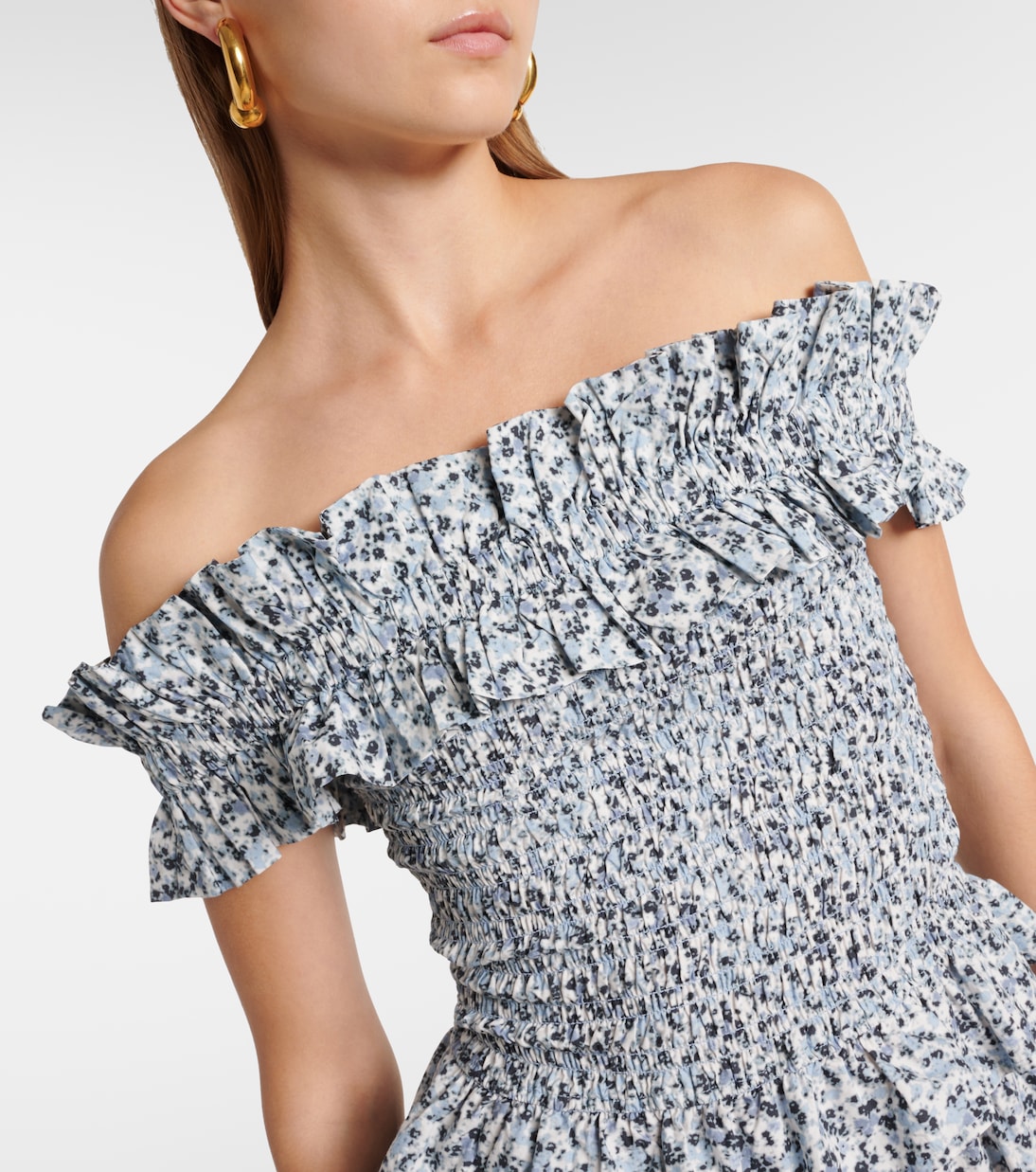 Floral smocked cotton top in blue - Ganni | Mytheresa