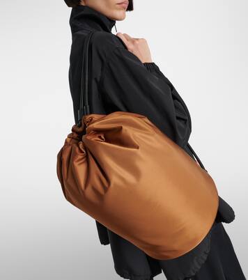 Sporty leather-trimmed backpack in brown - The Row | Mytheresa